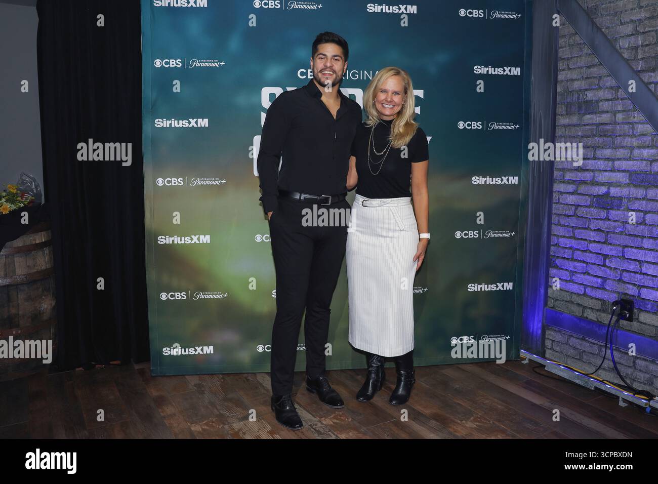 Sam Phelan of the Survivor 47 series cast and Julie Alley of the ...