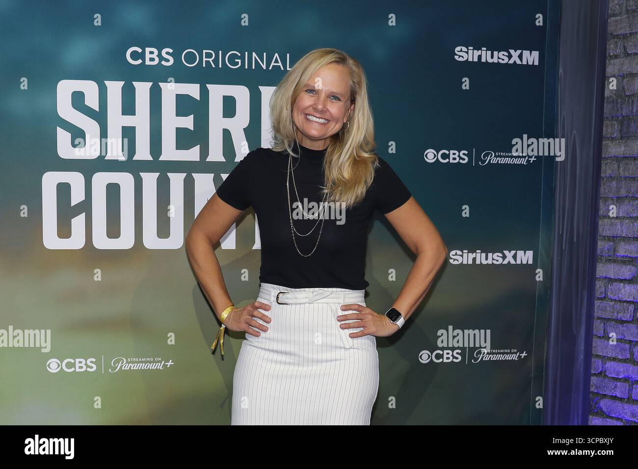 Julie Alley of the Survivor 45 series cast poses for the media during ...