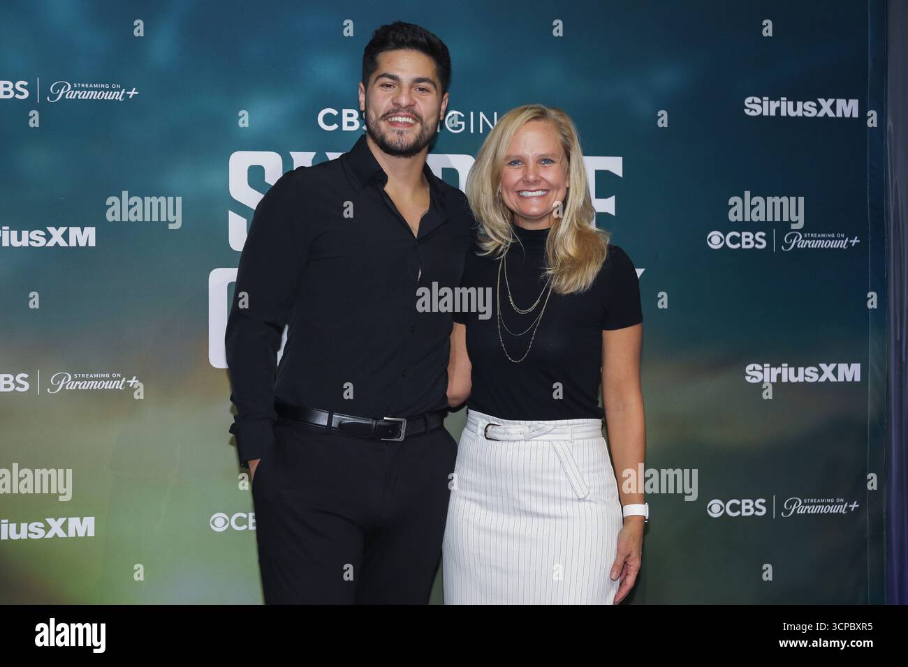 Sam Phelan of the Survivor 47 series cast and Julie Alley of the ...