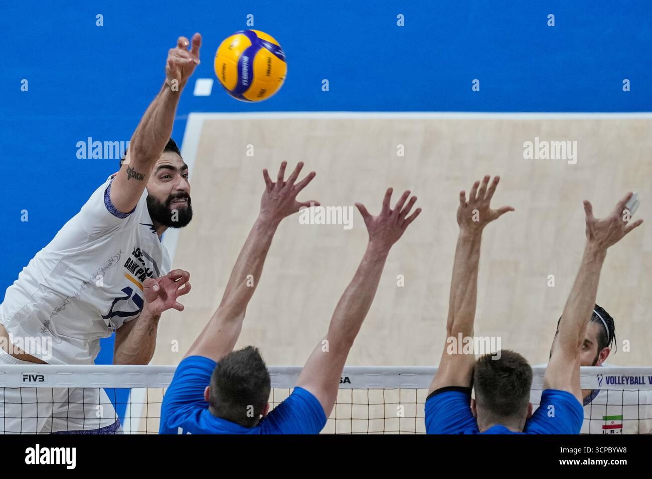 Ali Hajipour Moghadam Faroji of Iran spikes against Lukas Vasina and ...