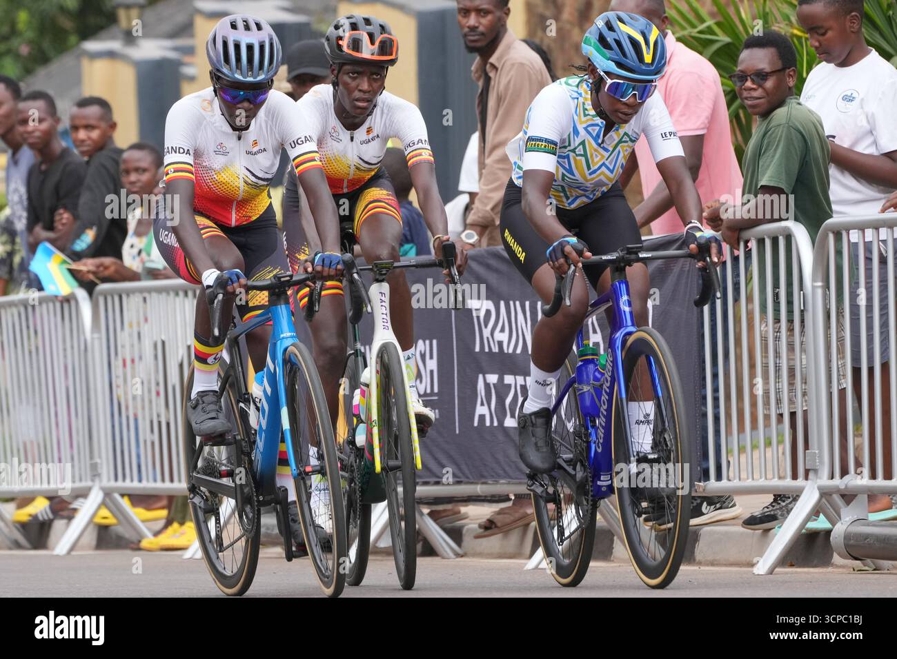 Rwanda's Martha Ntakirutimana, right, leads Uganda's Nantume Miria ...