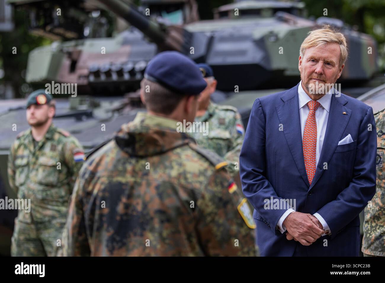 Dutch King Willem-Alexander, right, inspects military equipment during ...