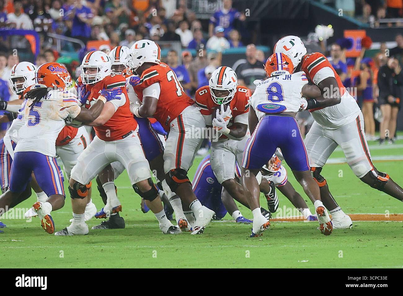 Miami Hurricanes running back CharMar Marty Brown (6) runs the ball at ...