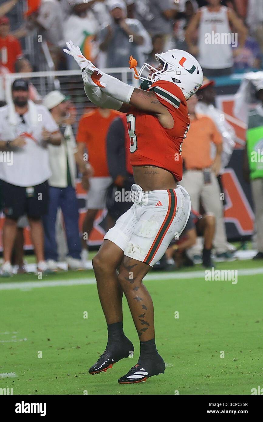 Miami Hurricanes defensive back Jakobe Thomas (8) celebrates a sack at ...