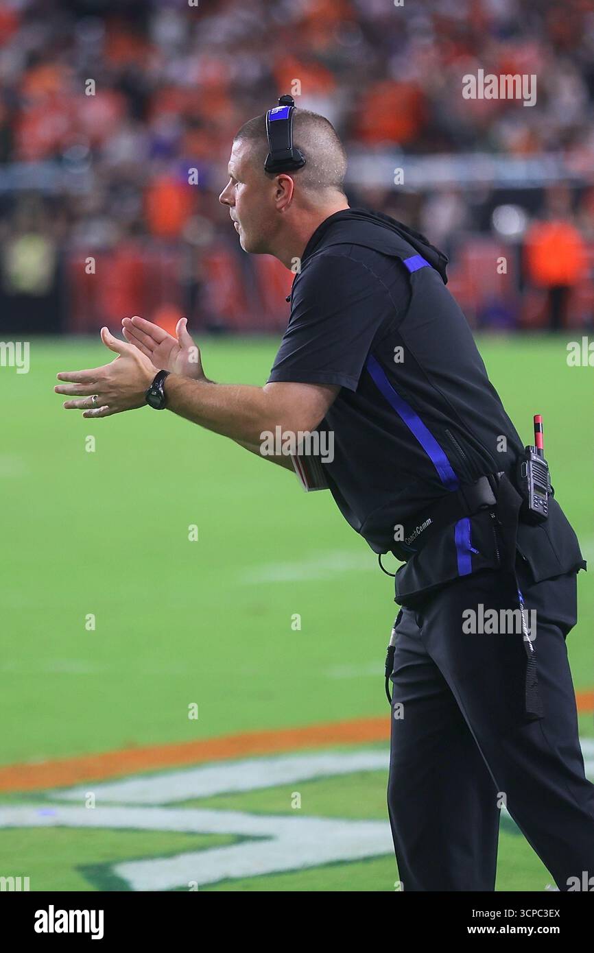 Florida Gators head coach Billy Napier encourages his team at Hard Rock ...