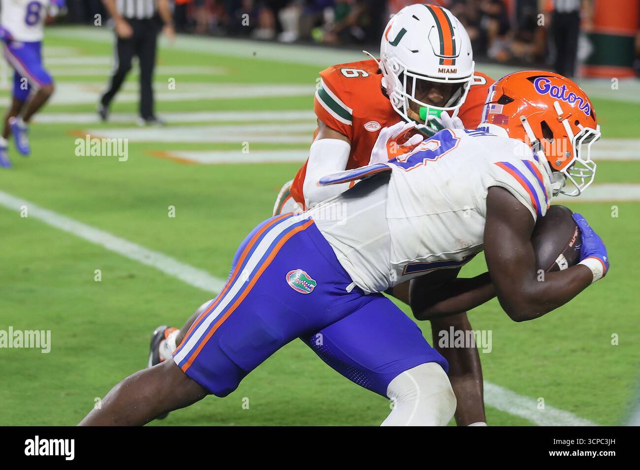 Florida Gators running back Jadan Baugh (13) runs for a touchdown at Hard Rock Stadium on ...
