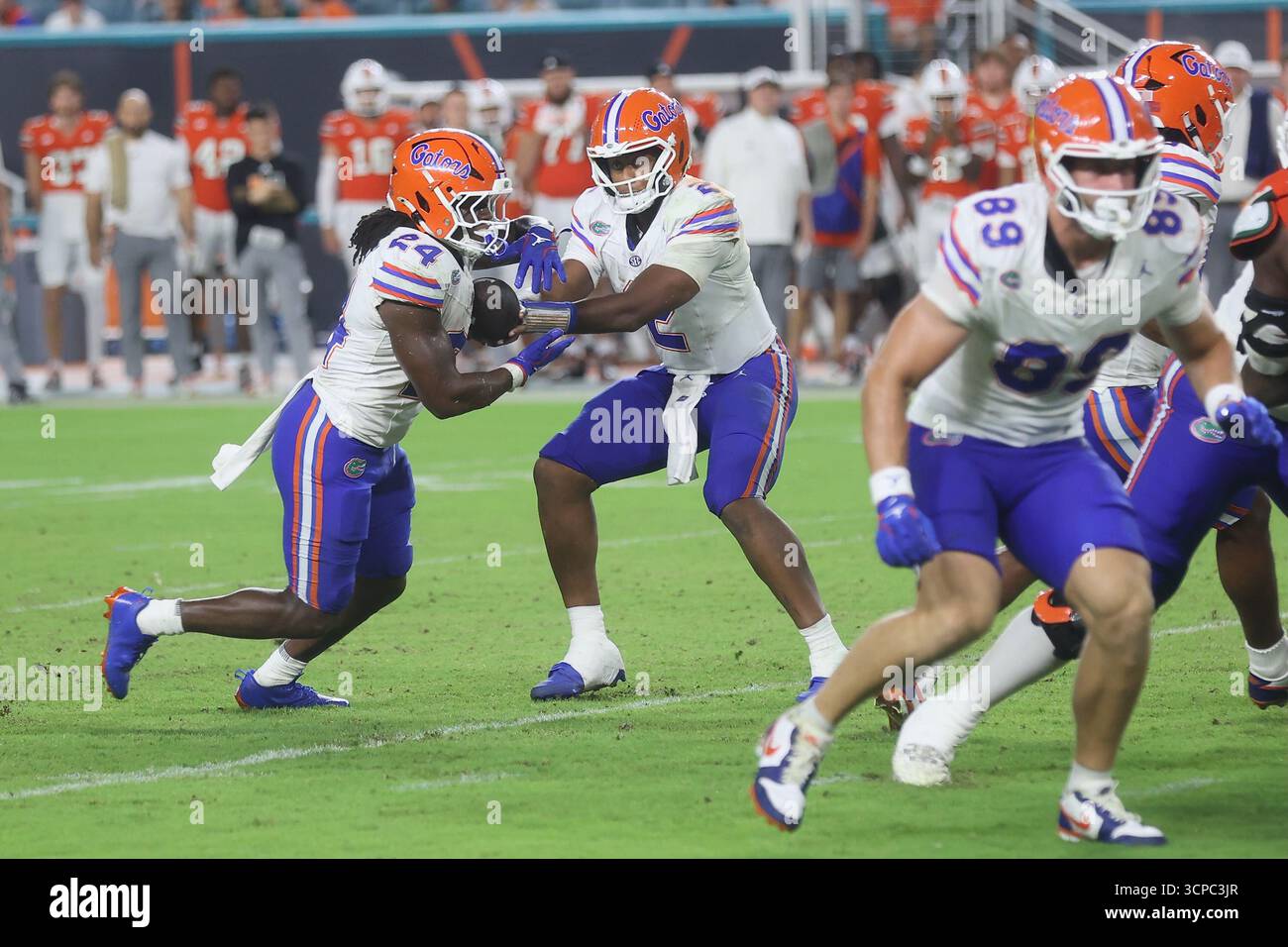 Florida Gators quarterback DJ Lagway (2) hands the ball to running back Ja’Kobi Jackson (24) at ...