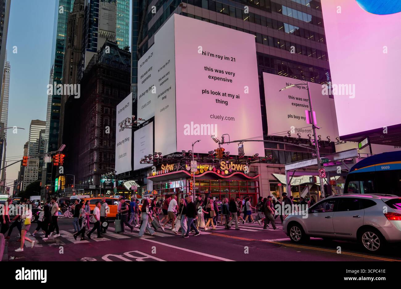 Traffic and crowds of people cross beneath advertising for Cluely in ...