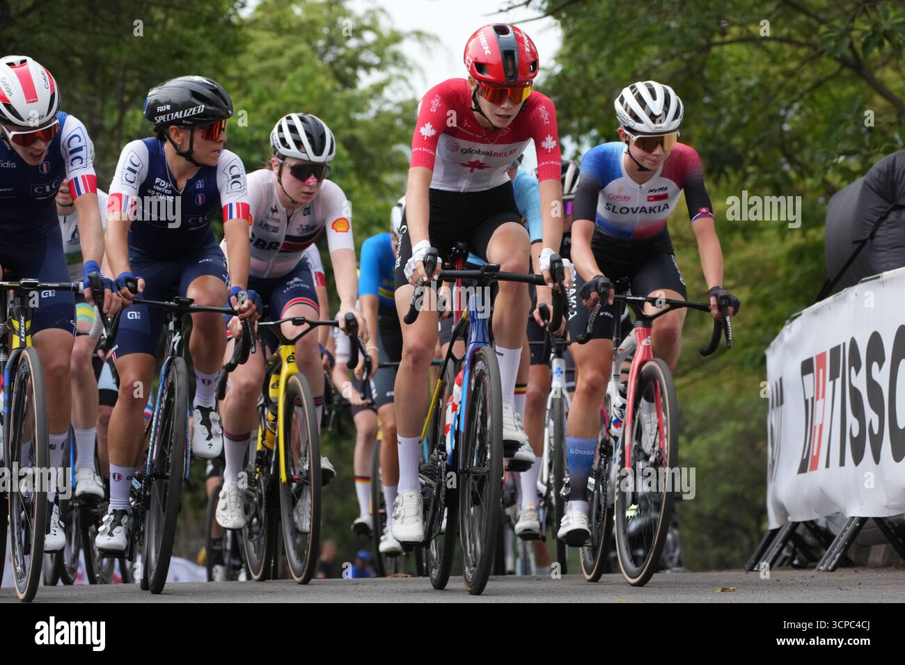 Canada's Isabella Holmgren, second from right, pedals in the pack ...