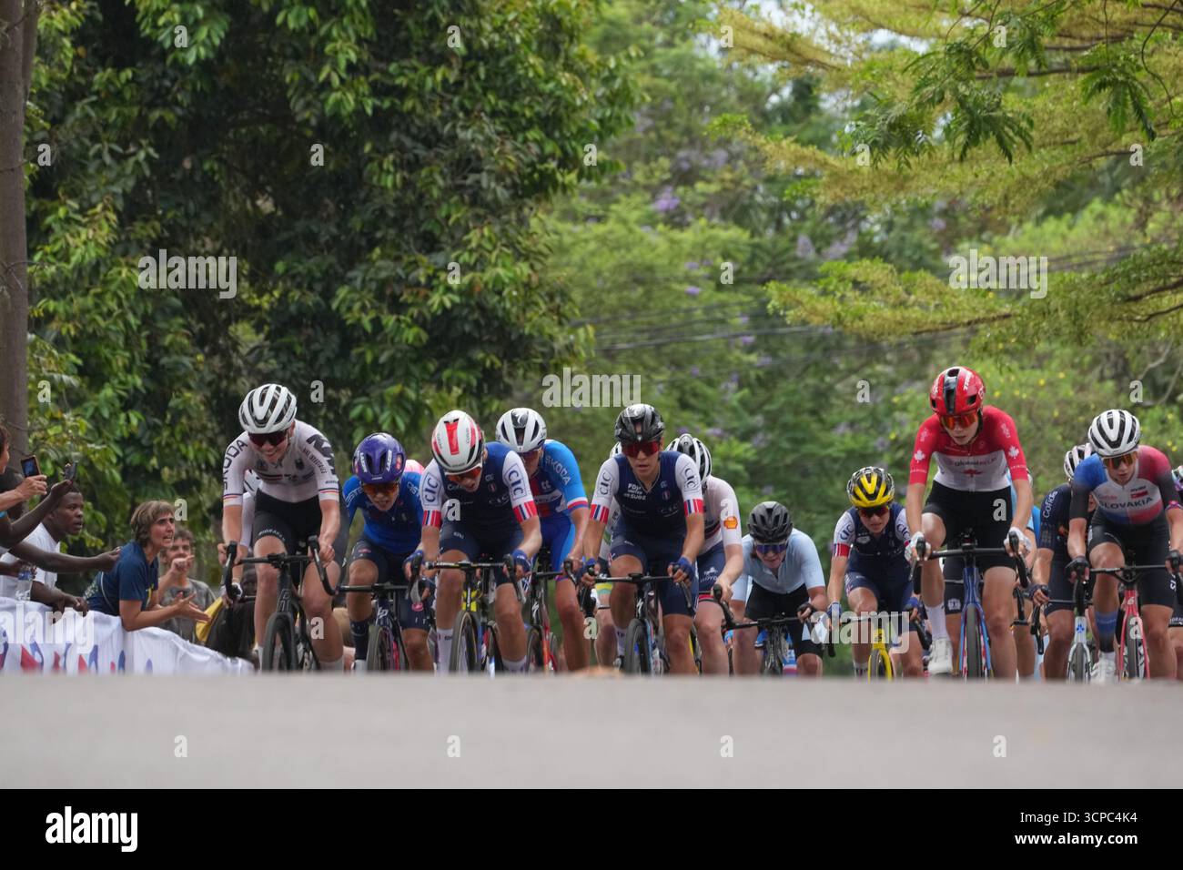 Canada's Isabella Holmgren, second from right, pedals in the pack ...