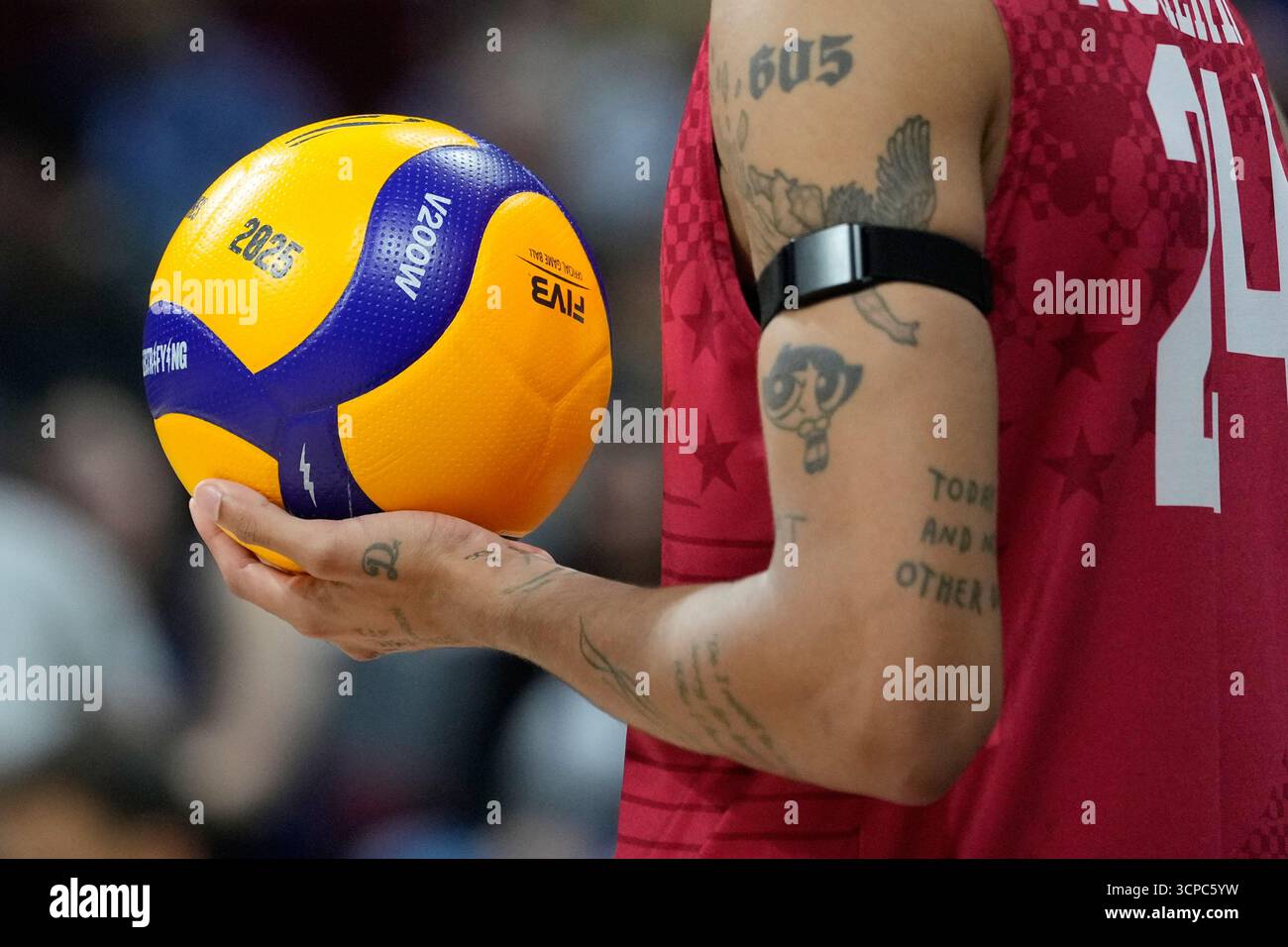 Merrick McHenry of the United States holds the ball as he prepares to ...
