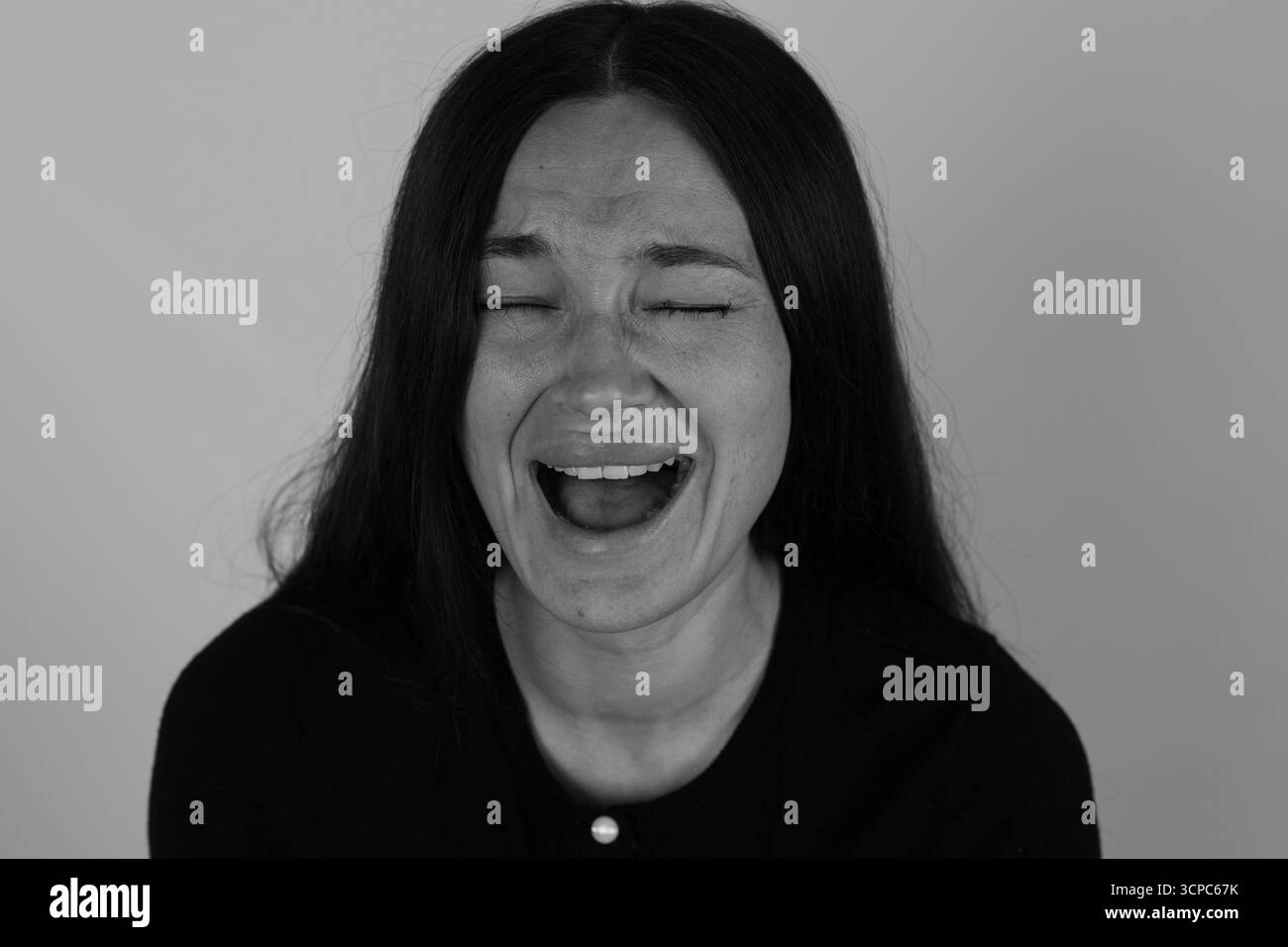 Woman in deep laughter hi-res stock photography and images - Alamy