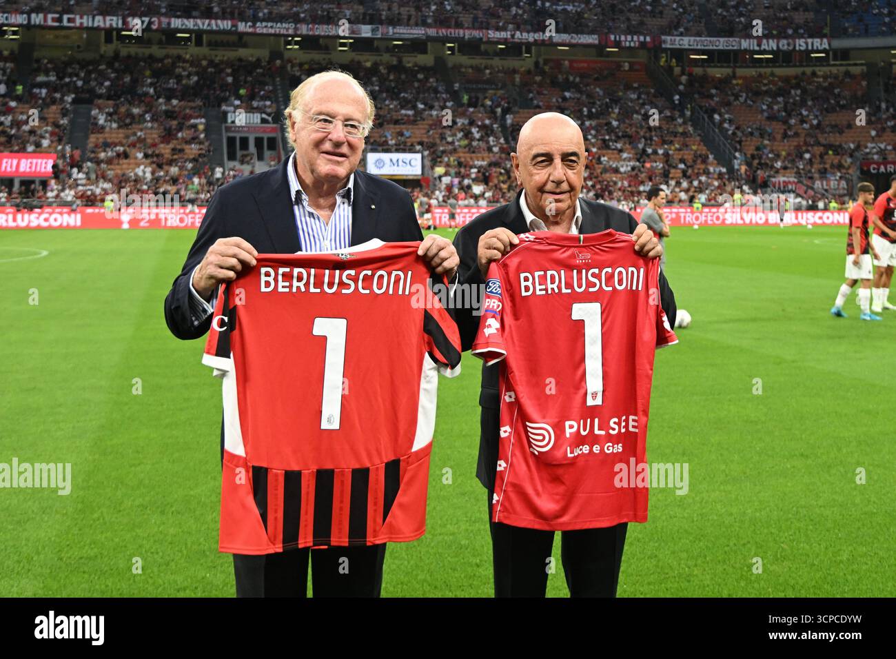 Adriano Galliani and Paolo Scaroni with Silvio Berlusconi jersey before ...