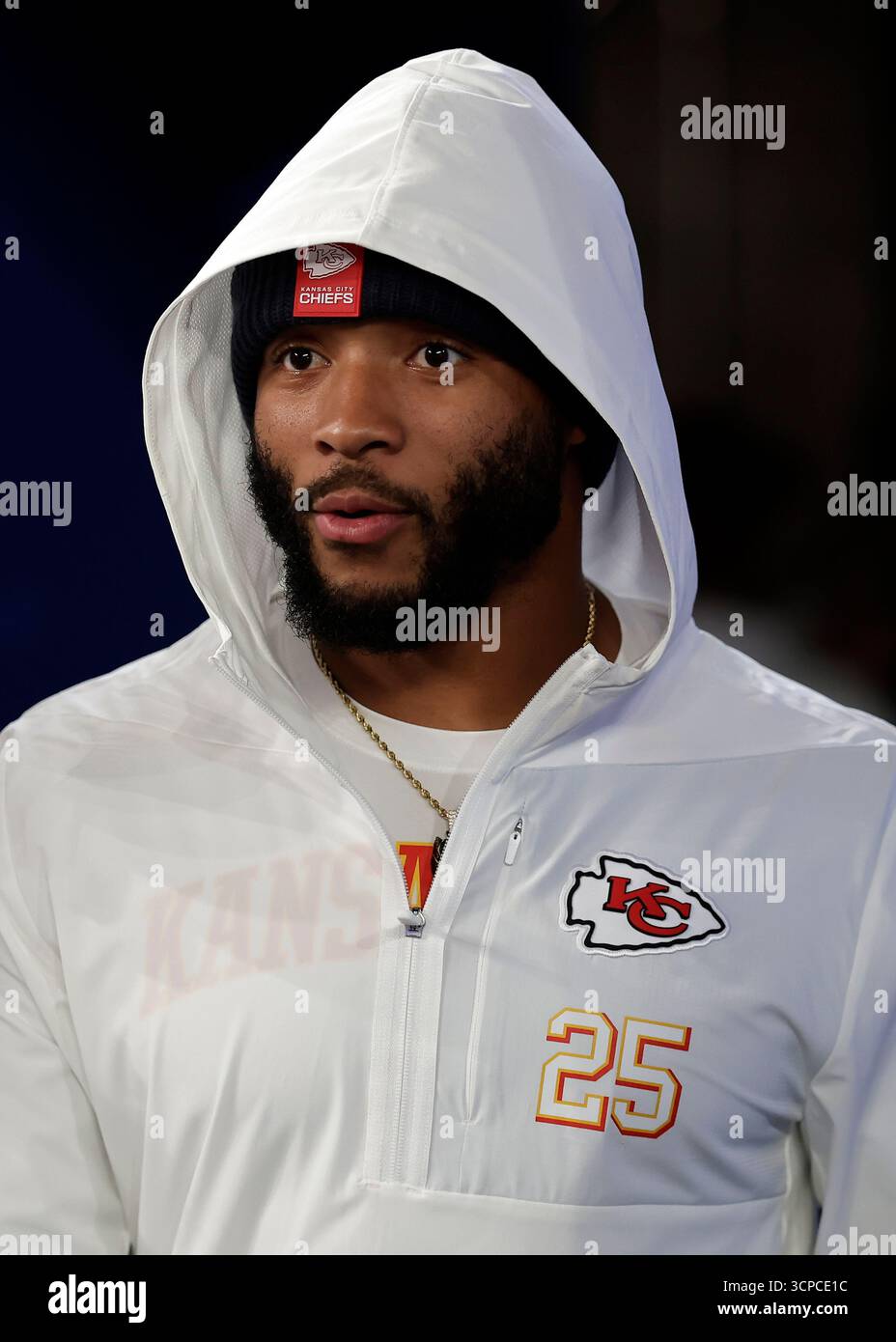 Kansas City Chiefs running back Elijah Mitchell (25) walks onto the ...