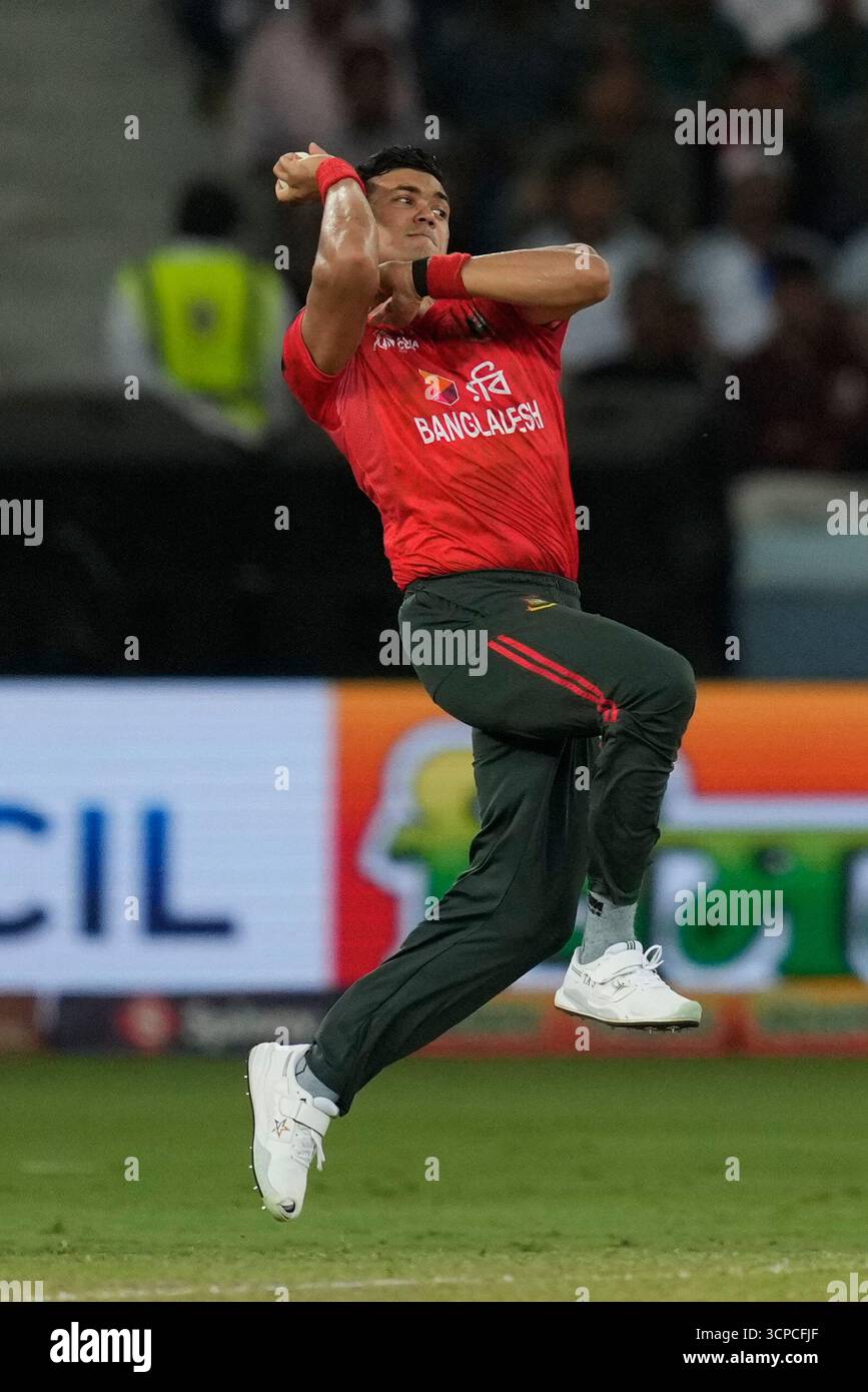 Bangladesh's Taskin Ahmed bowls a delivery during the Asia Cup cricket match between Bangladesh ...