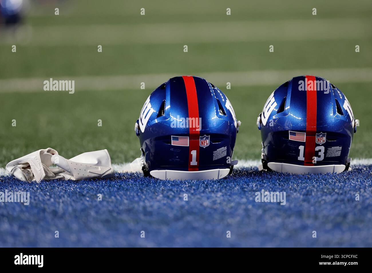 New York Giants helmets are seen before an NFL football game against ...
