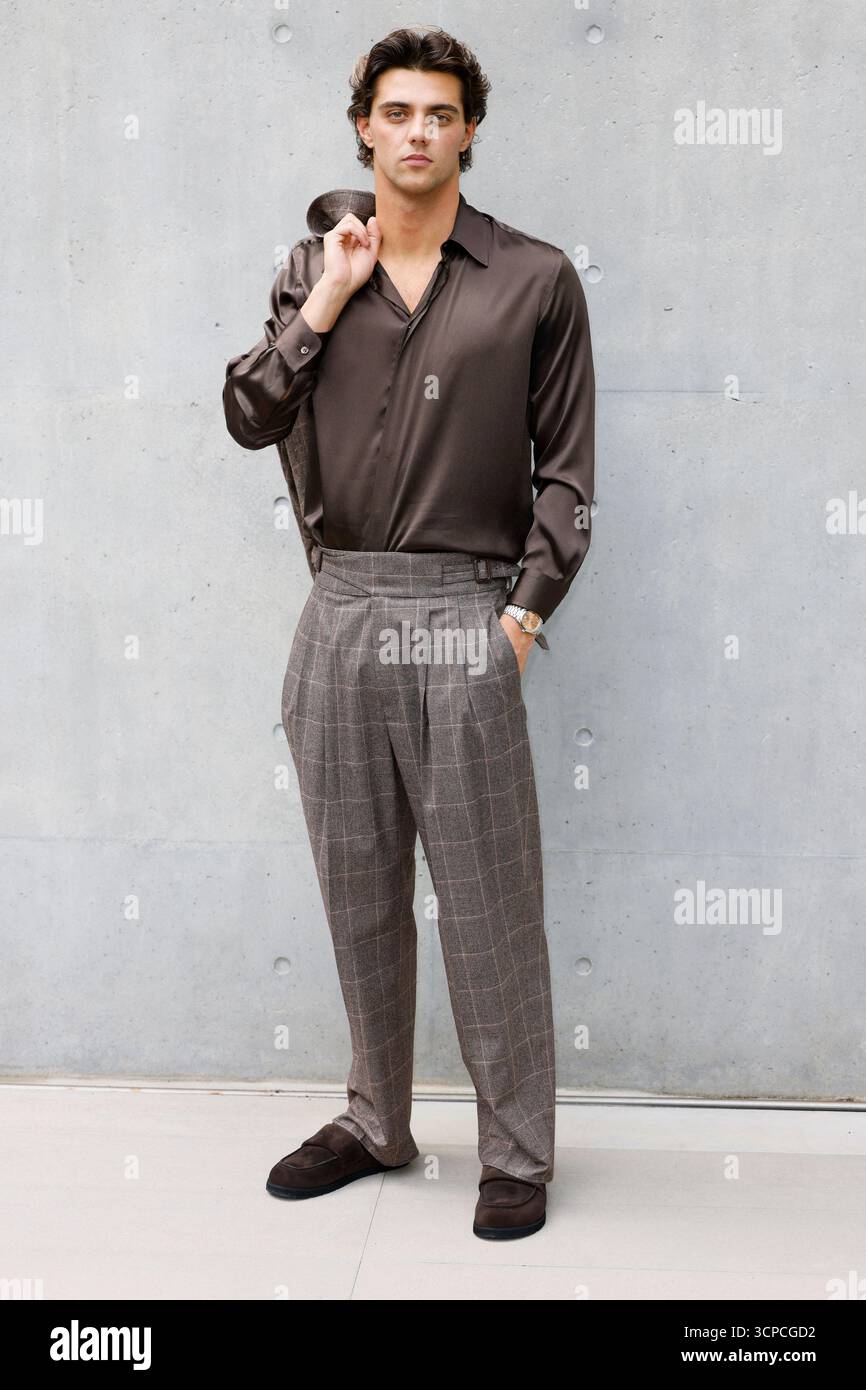 Thomas Ceccon attends the Emporio Armani fashion show during Milan's ...