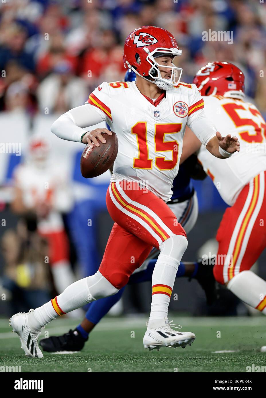 Kansas City Chiefs quarterback Patrick Mahomes (15) runs with the ball ...