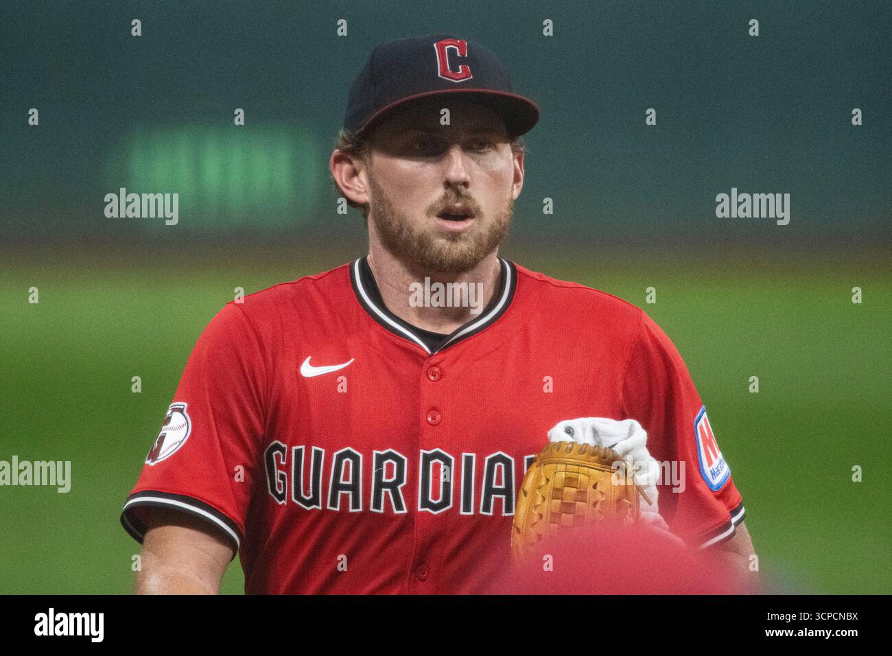 Cleveland Guardians starting pitcher Tanner Bibee walks to the dugout ...