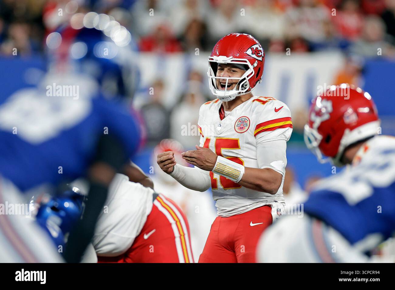 Kansas City Chiefs quarterback Patrick Mahomes (15) at the line of scrimmage during an NFL ...