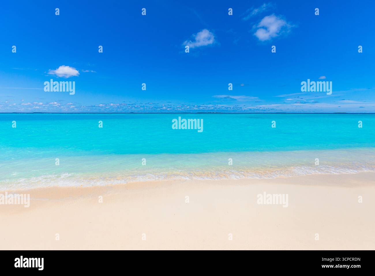 Sunny beach landscape closeup of sea sand and sky calm waves tropical ...
