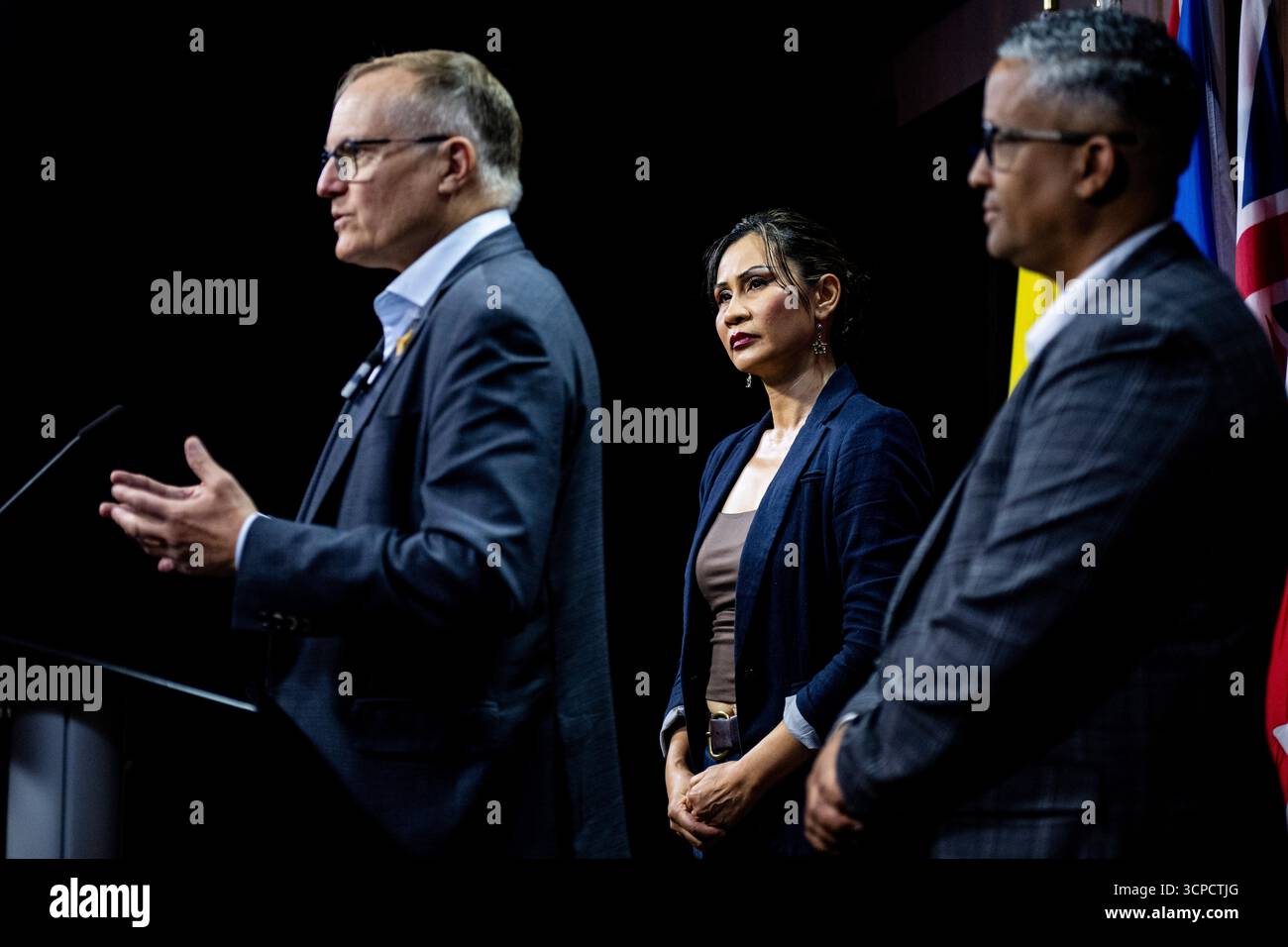 Doris Mah, Former Chief of Staff to NDP MP Peter Julian, centre, looks ...