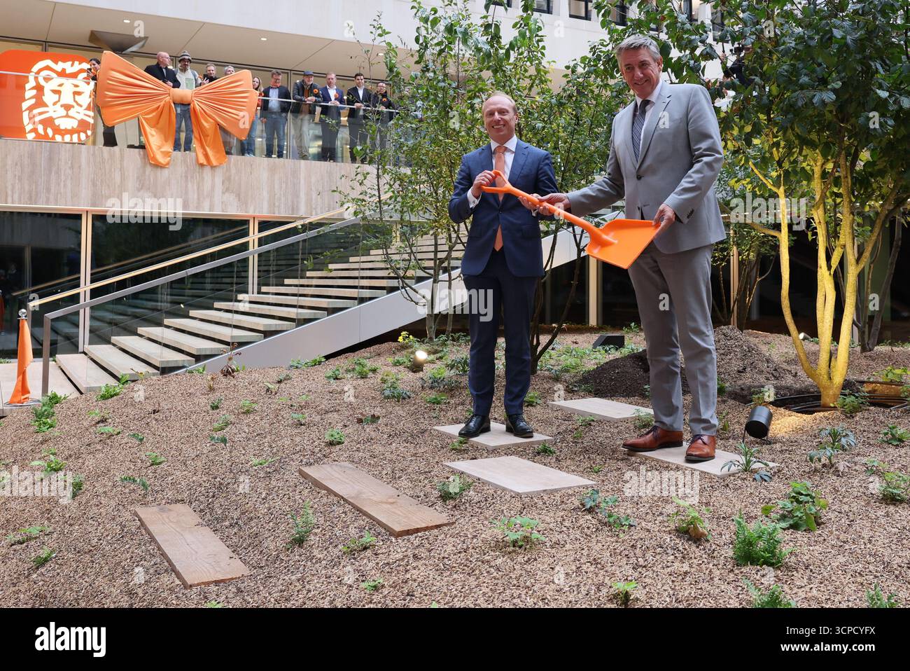 ING CEO Peter Adams, Federal minister Jan Jambon and pictured during the inauguration of the ...
