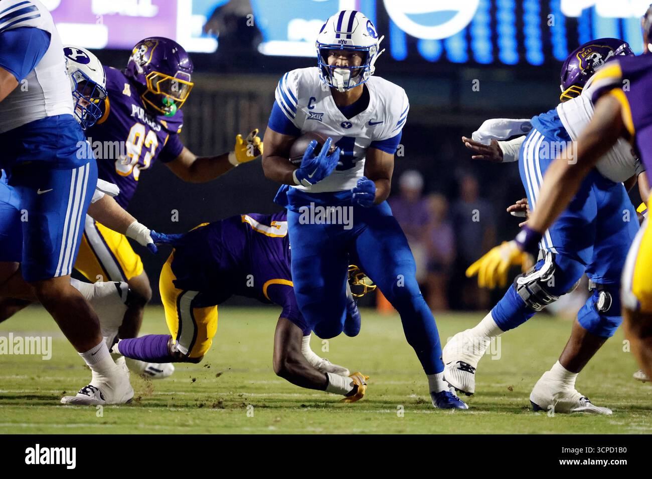 BYU's LJ Martin (4) runs the ball against East Carolina during the ...
