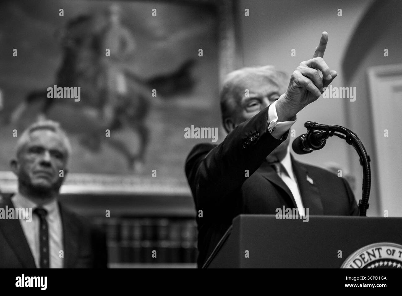 President Donald Trump answers questions from members of the media ...