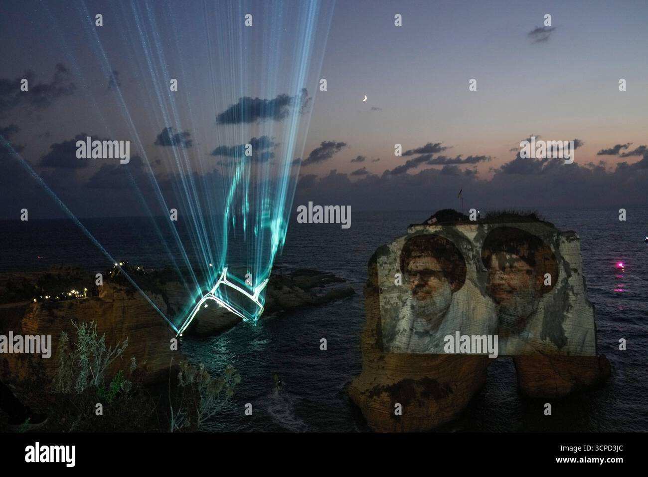 Portraits of the two former Hezbollah leaders Sayyed Hassan Nasrallah ...