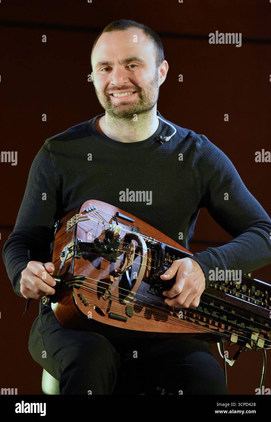 Johannes Geworkian Hellman on stage for Symbio in Concert, Ramsey ...