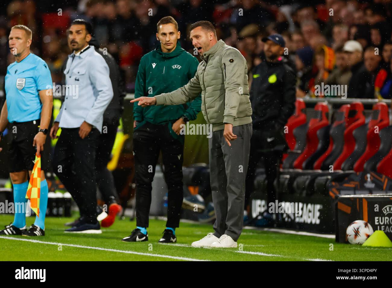 fourth official Kevin Kaivoja (EST) and Head coach Melvin Boel of Go ...