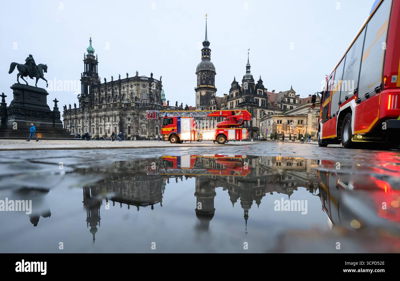 25 September 2025, Saxony, Dresden: Emergency vehicles from the Dresden ...