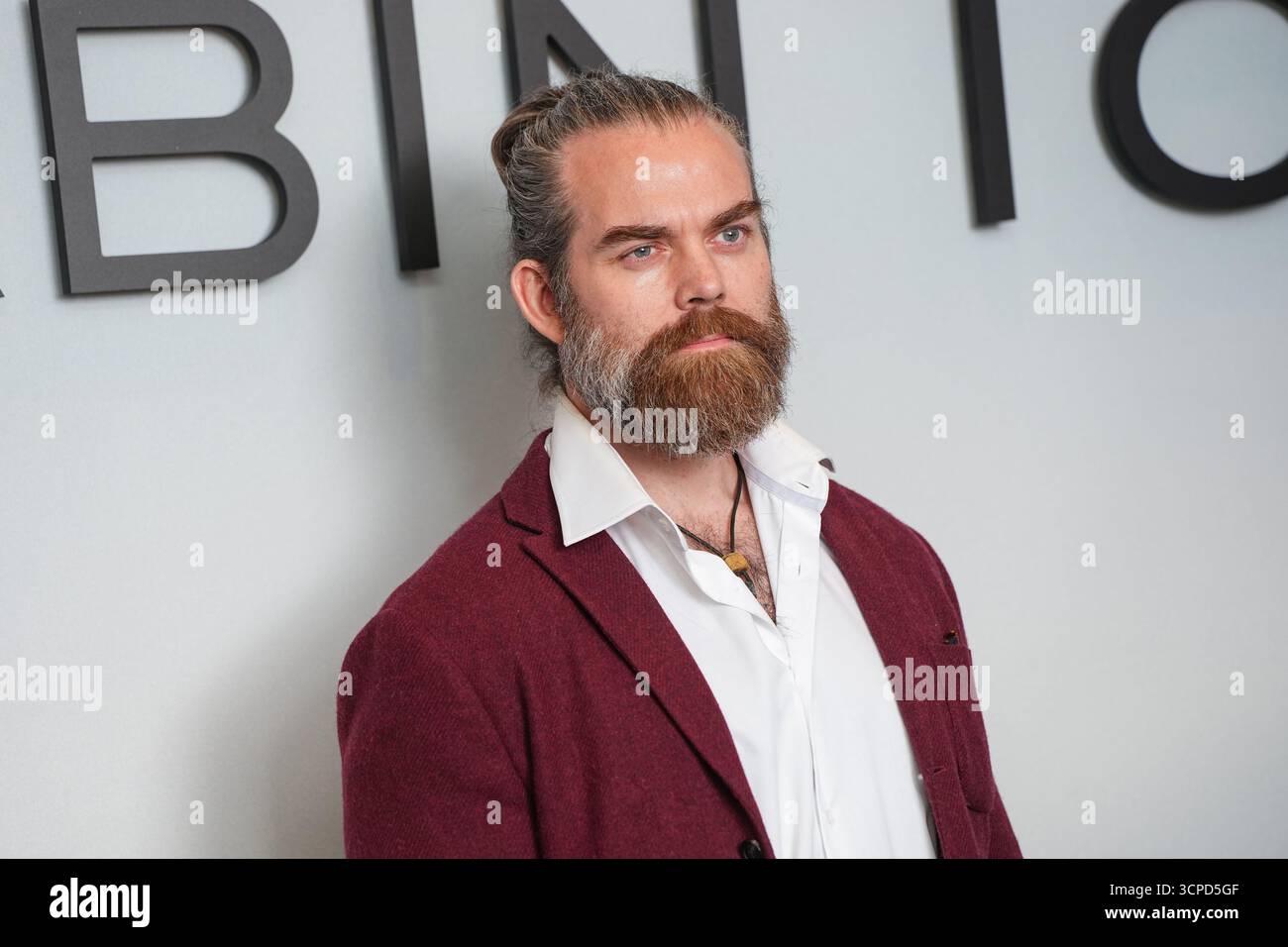 Christopher Rygh poses for photographers upon arrival at the premiere ...