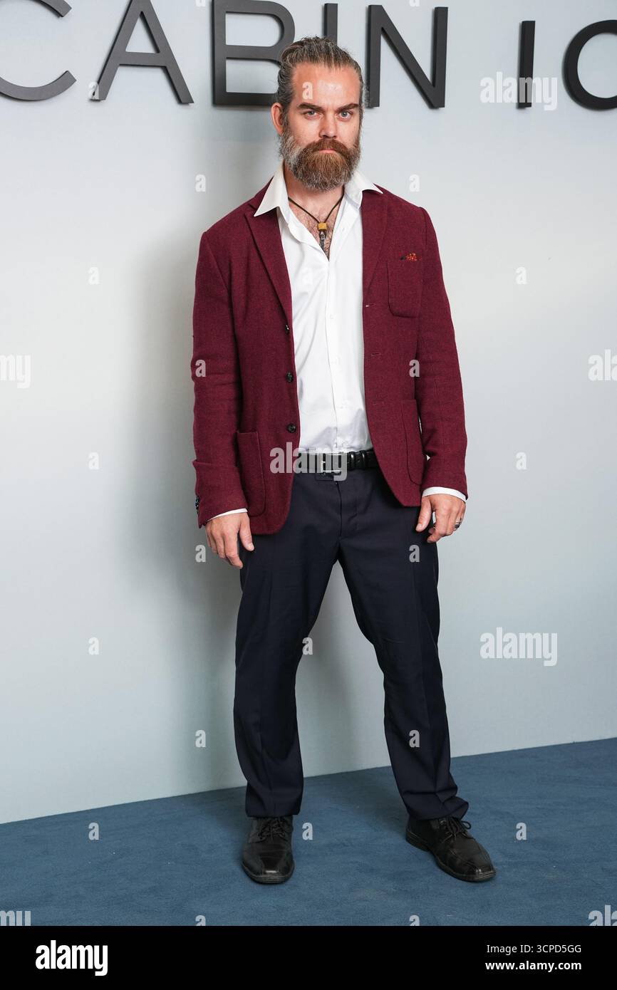 Christopher Rygh poses for photographers upon arrival at the premiere ...