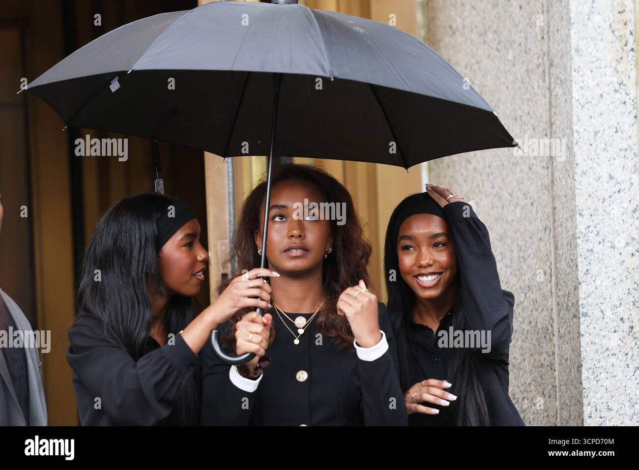 Chance Combs, center, exits Manhattan federal court with D'Lila Combs ...