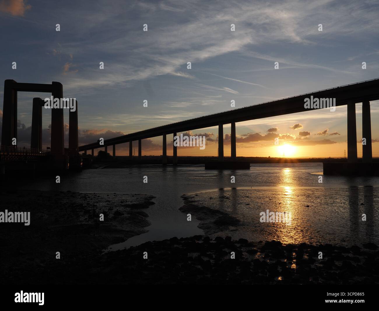Sheerness, Kent, UK. 25th Sep, 2025. UK Weather: sunset through the ...