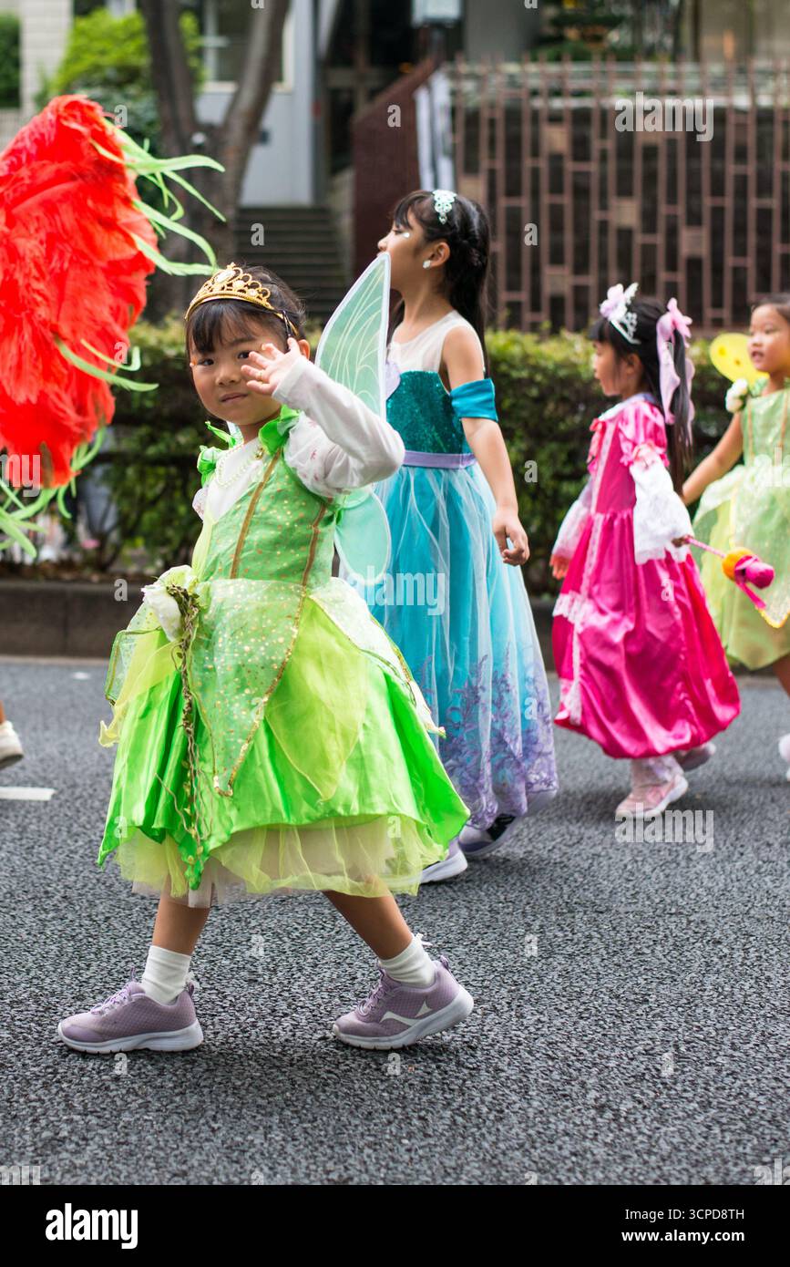 TOKYO, JAPAN - 27 OCTOBER, 2024 - Vertical picture of Japanese girls at ...