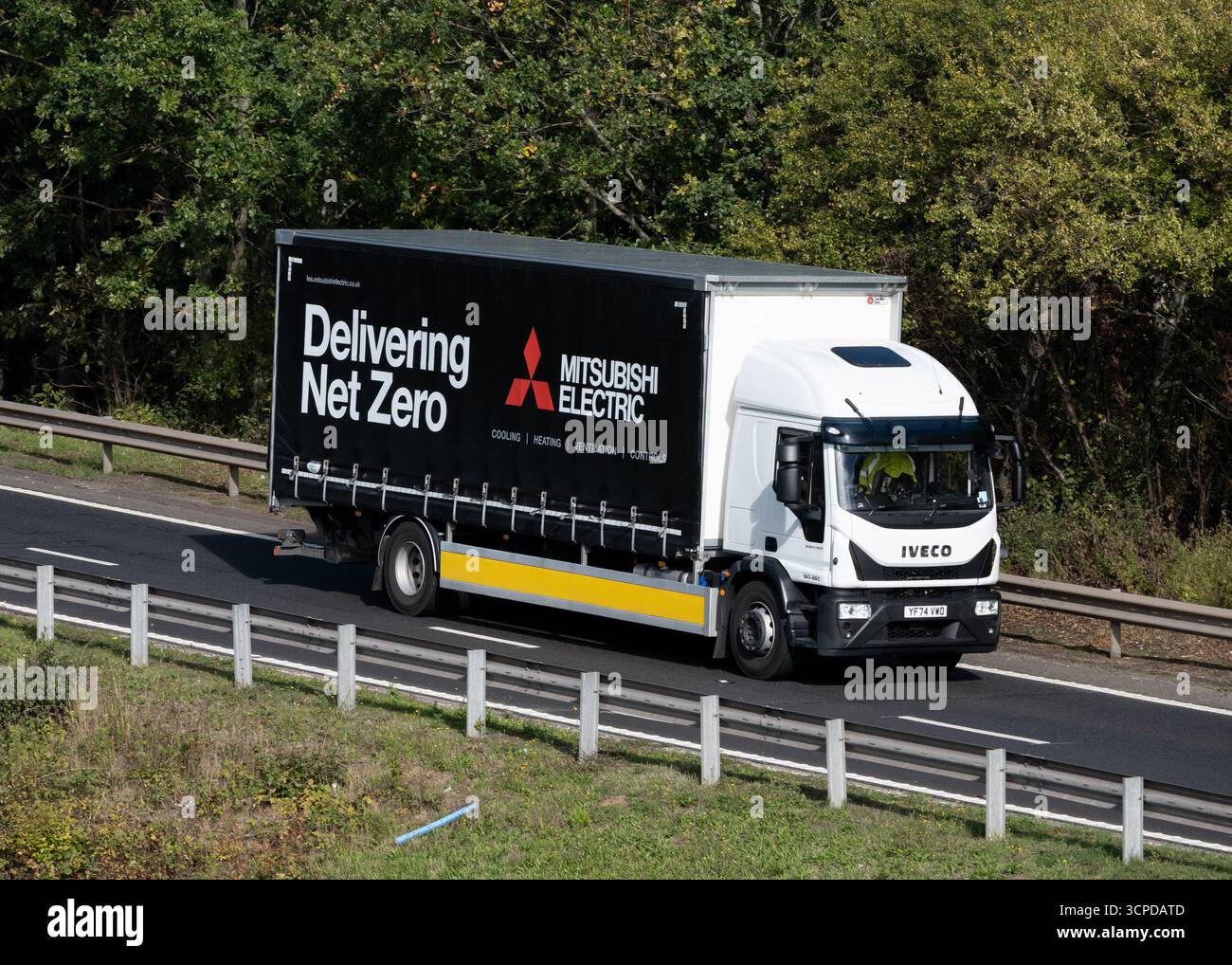 Mitsubishi Electric lorry, M40 slip road, Warwick, UK Stock Photo - Alamy