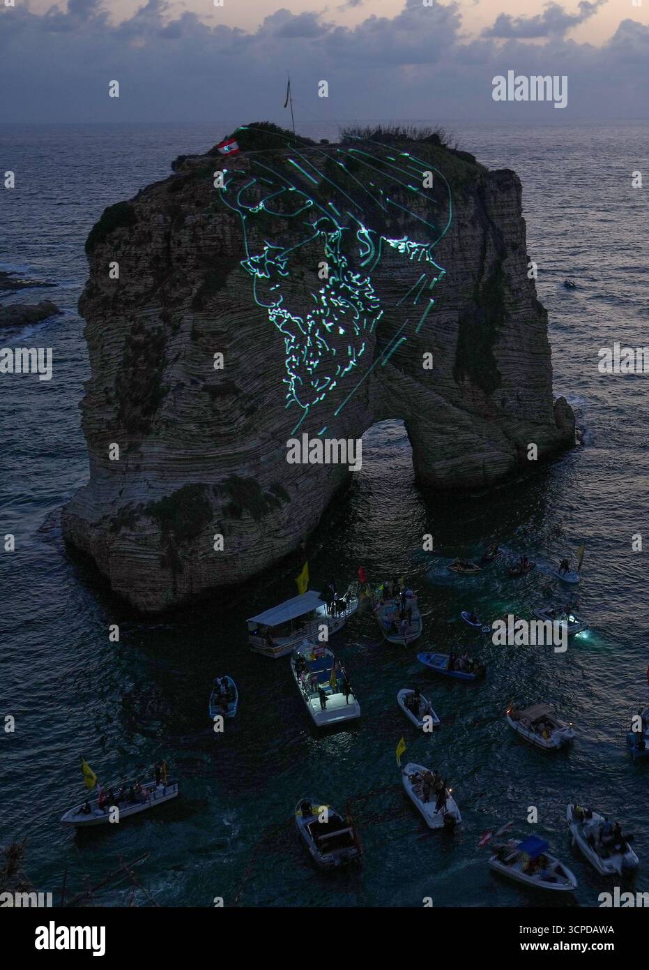 The landmark Raouche sea rock is illuminated by a portrait of late ...