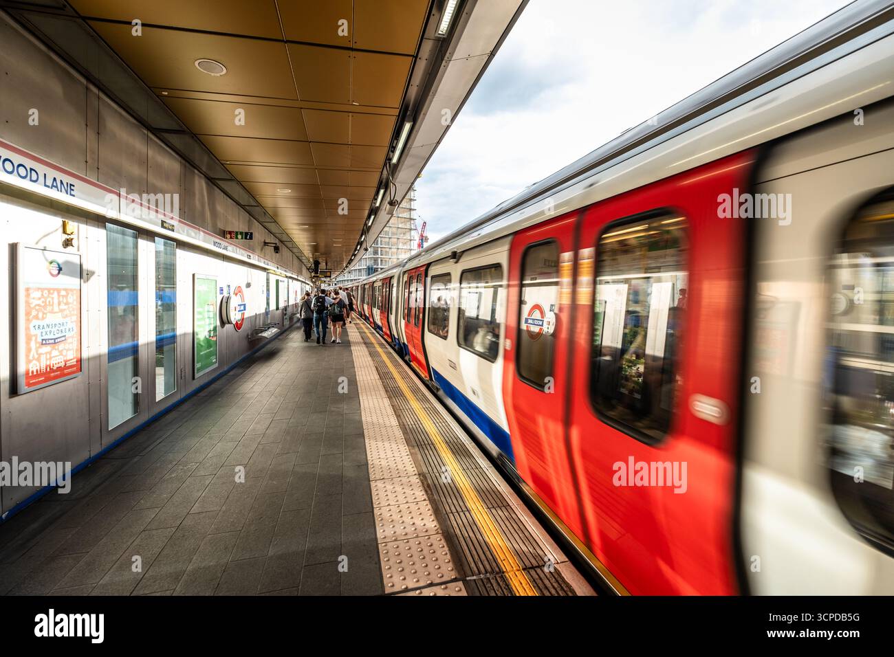 London Underground Moments. People at the platform of the undergorund ...