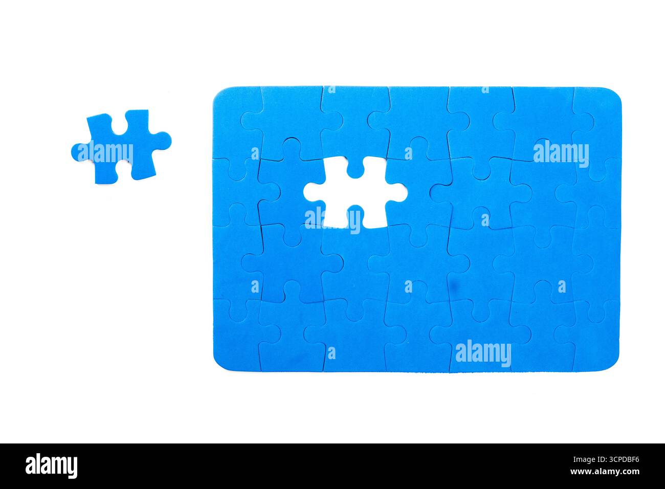 Bright blue puzzle piece missing its final connection for completion ...