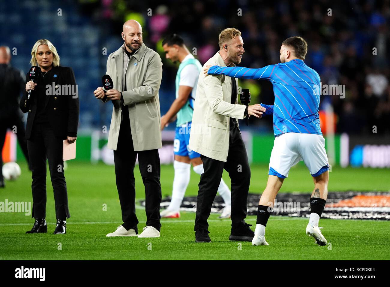 Pundit and former player Scott Arfield and Rangers' Nicolas Raskin ...
