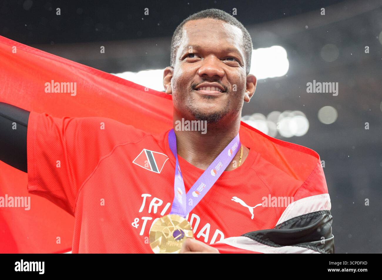 Keshorn Walcott (Trinidas and Tobago) with his gold medal after the ...