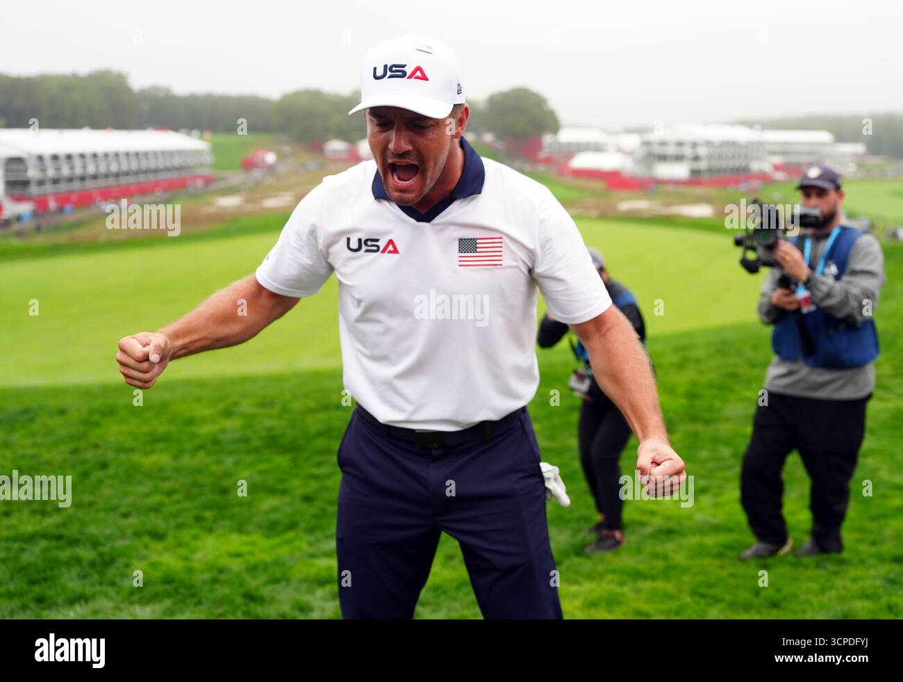 Bryson DeChambeau of Team United States on the 18th green at the ...