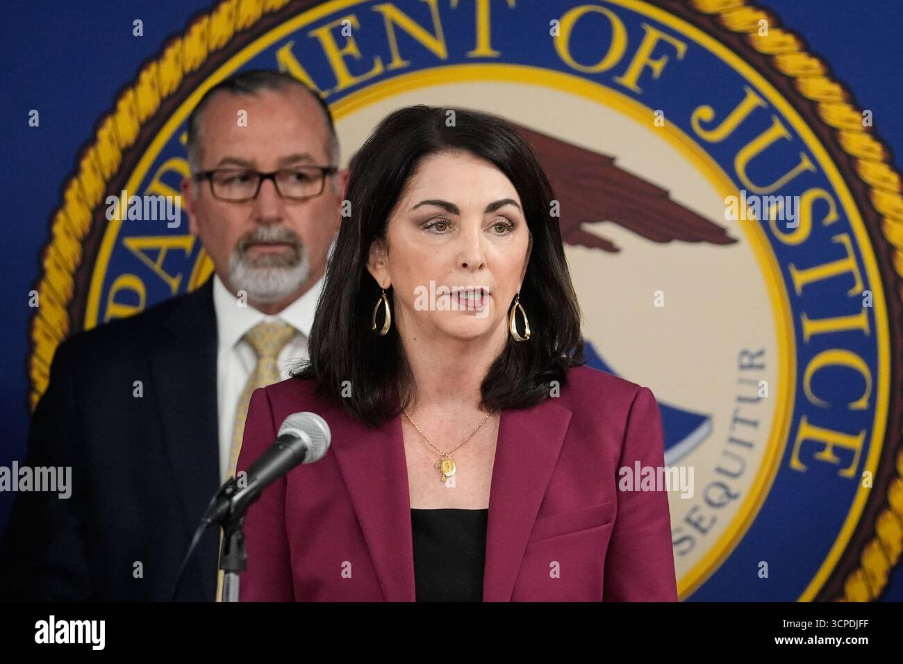 Nancy E. Larson, acting U.S. Attorney for the Northern District of Texas, makes comments during ...