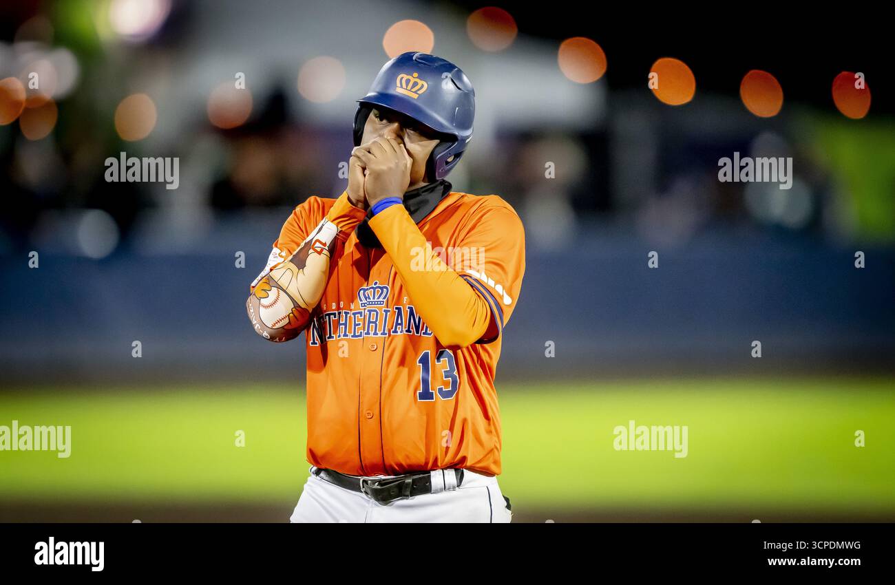 ROTTERDAM - Dutch baseball player PROFAR Juremi in action against ...