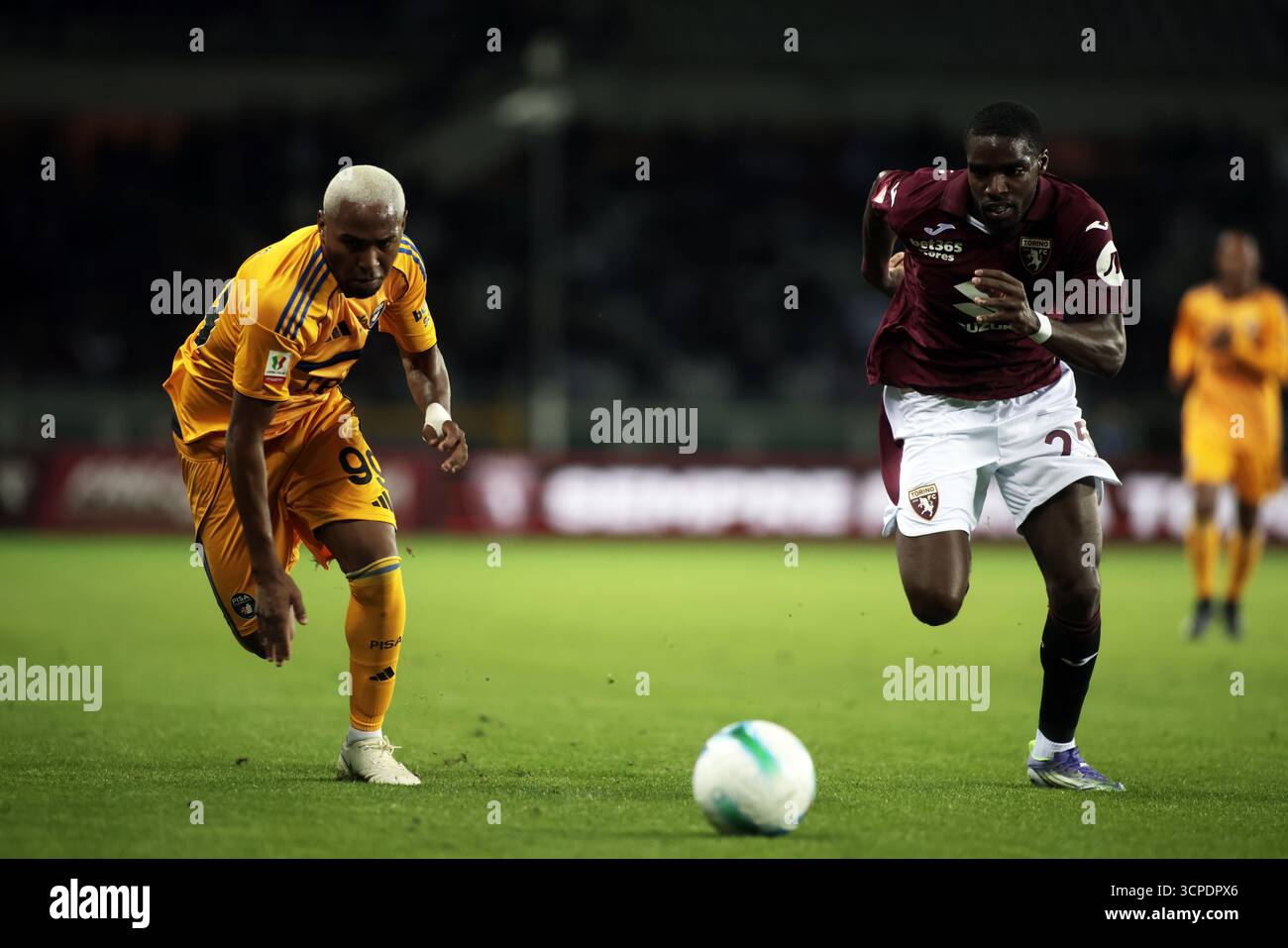 Lorran of Pisa SC and Niel Nkounkou of Torino Fc during the Coppa ...