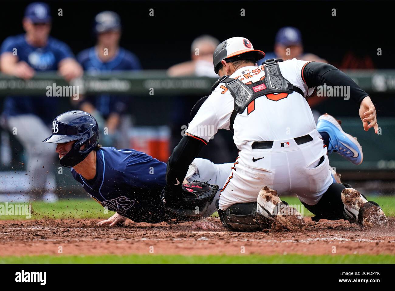 Tampa Bay Rays' Carson Williams, left, is tagged out at home plate by ...