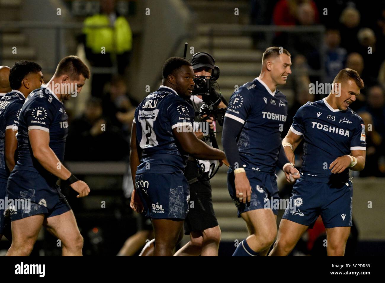 Sale Sharks' players celebrate Nathan Jibulu's (third right) try during ...